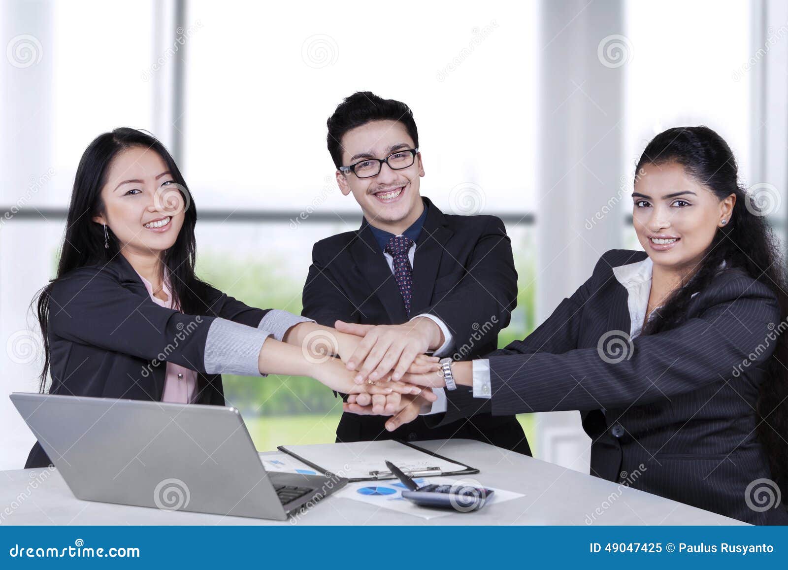 Business People Joining Hands in the Office Stock Image - Image of ...