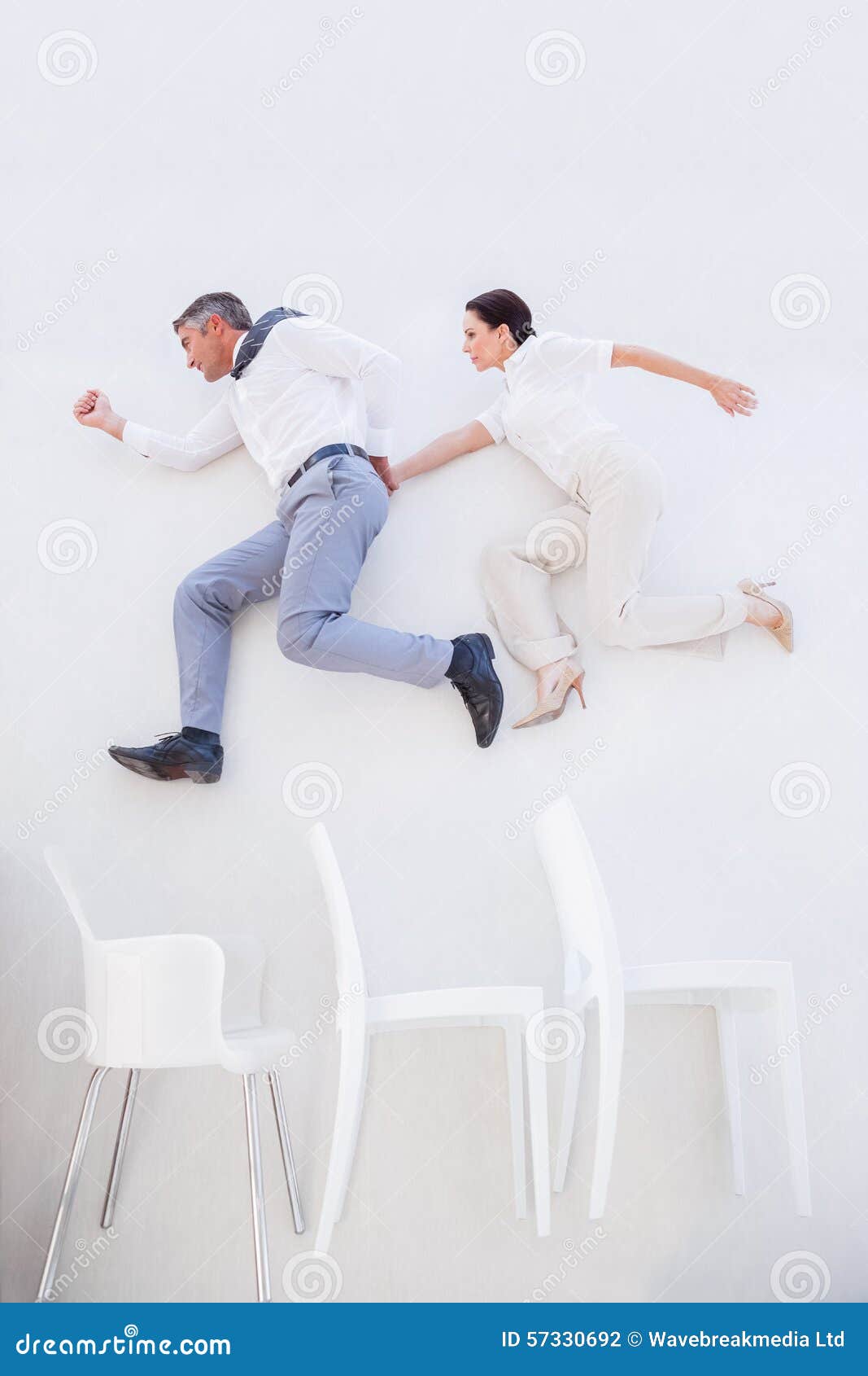 Business People Jumping Over Chairs Stock Photo - Image of cheerful ...