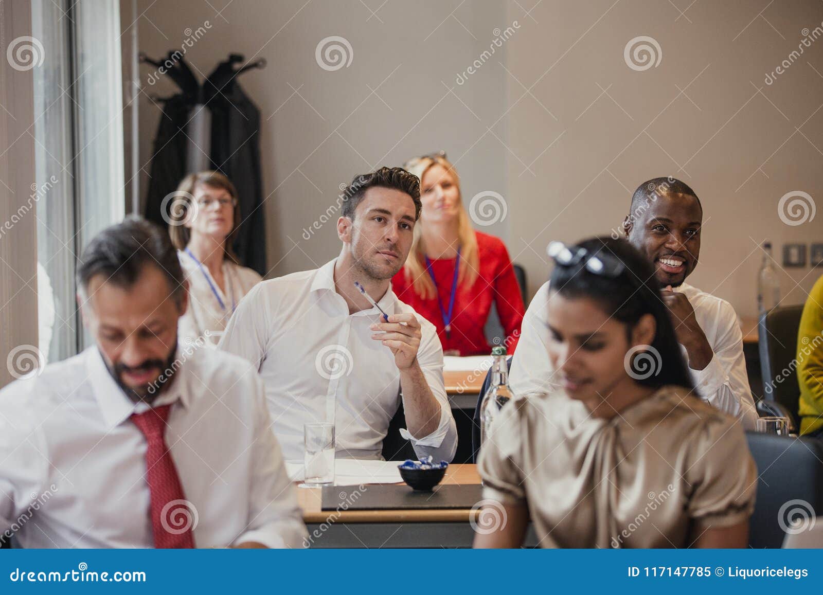 Business People Listening during a Conference Stock Image - Image of ...