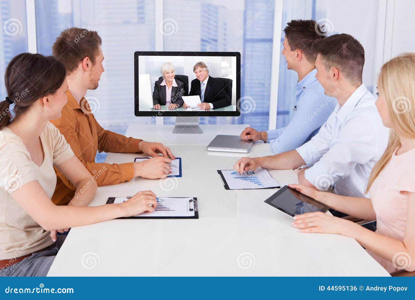 Business People Looking at Computer Monitors in Office Stock Photo ...
