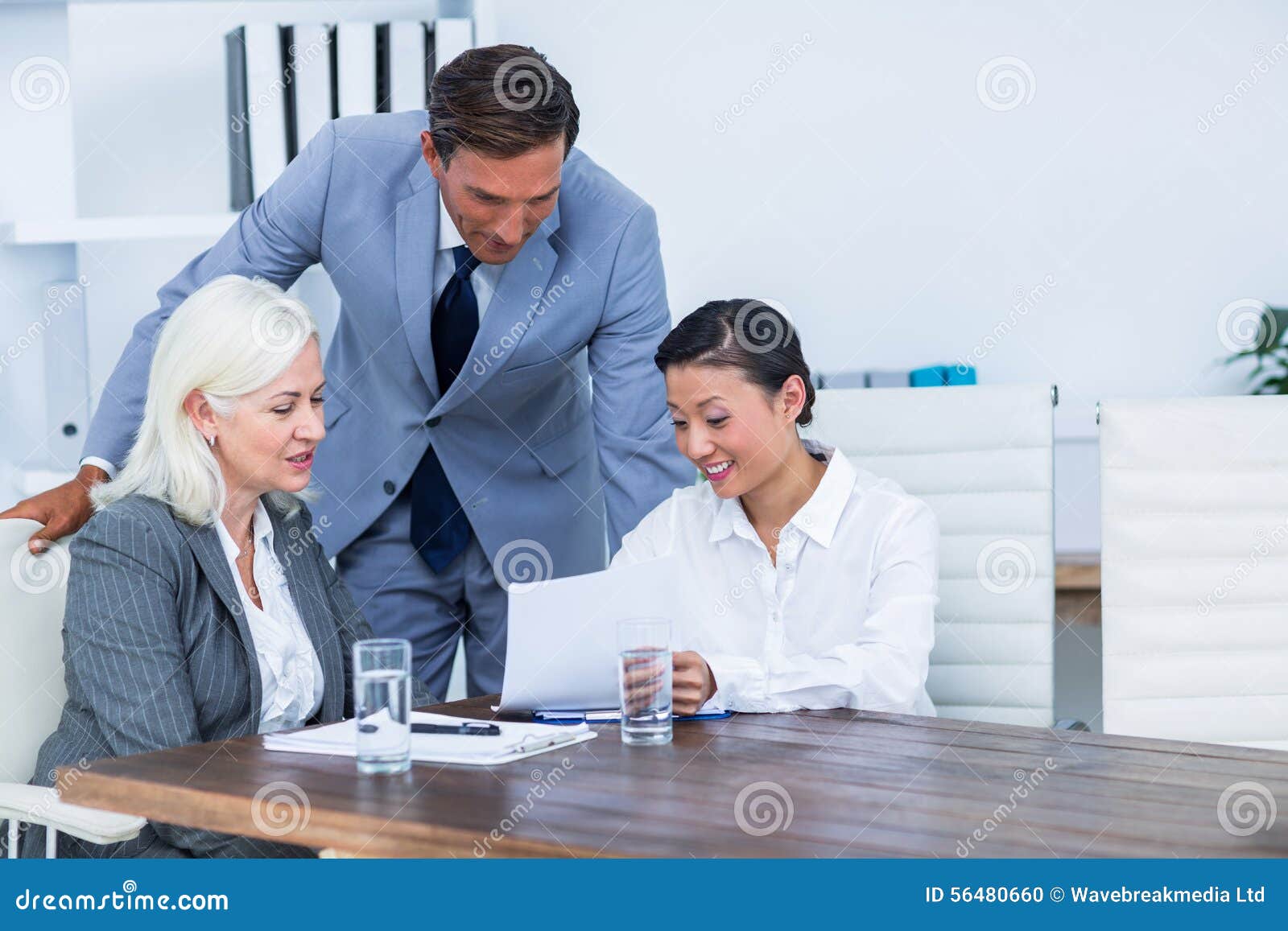 Business People Looking at Documents Stock Photo - Image of ...