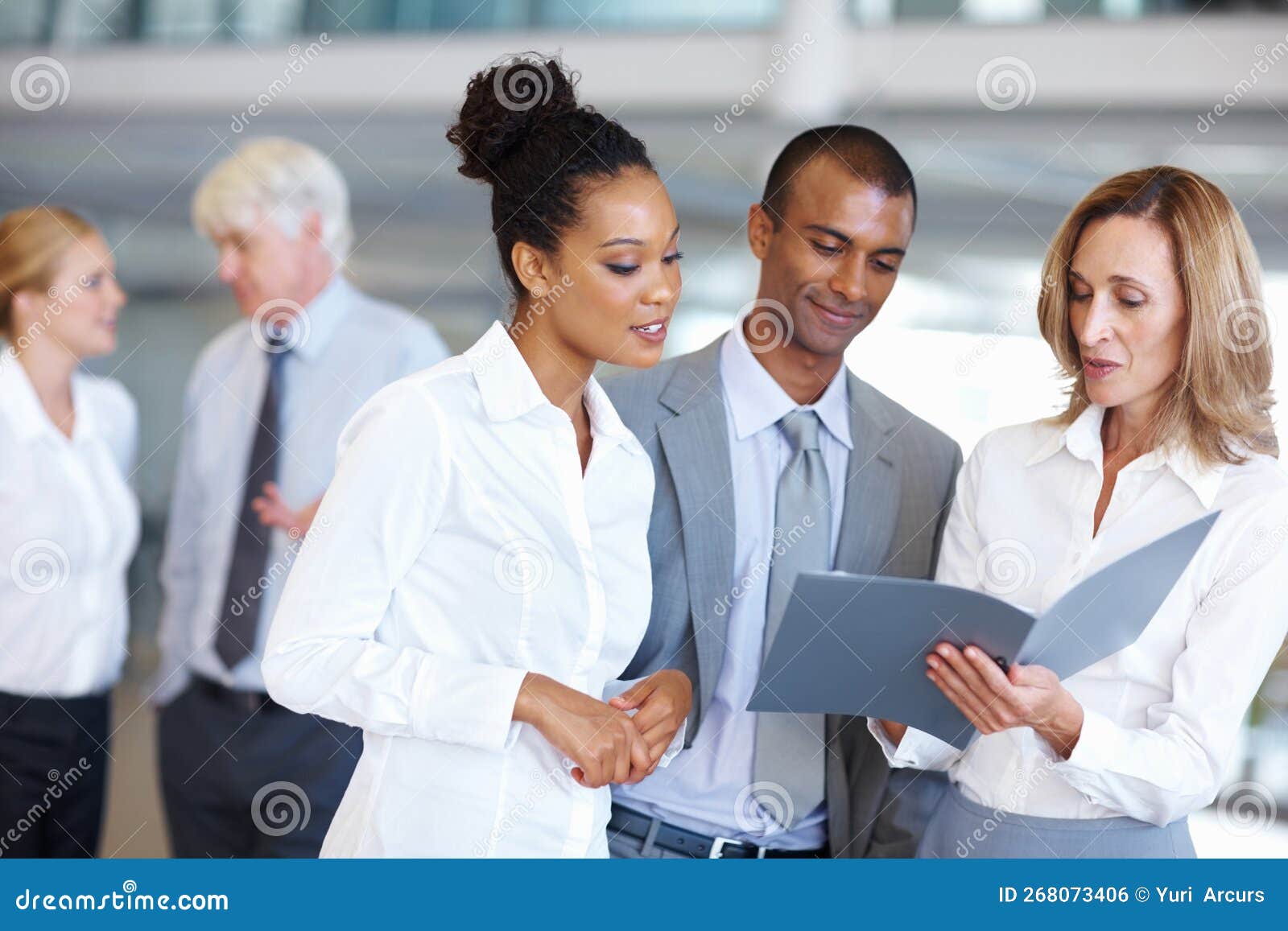 Business People Looking at Documents. Portrait of Multi Ethnic Business ...
