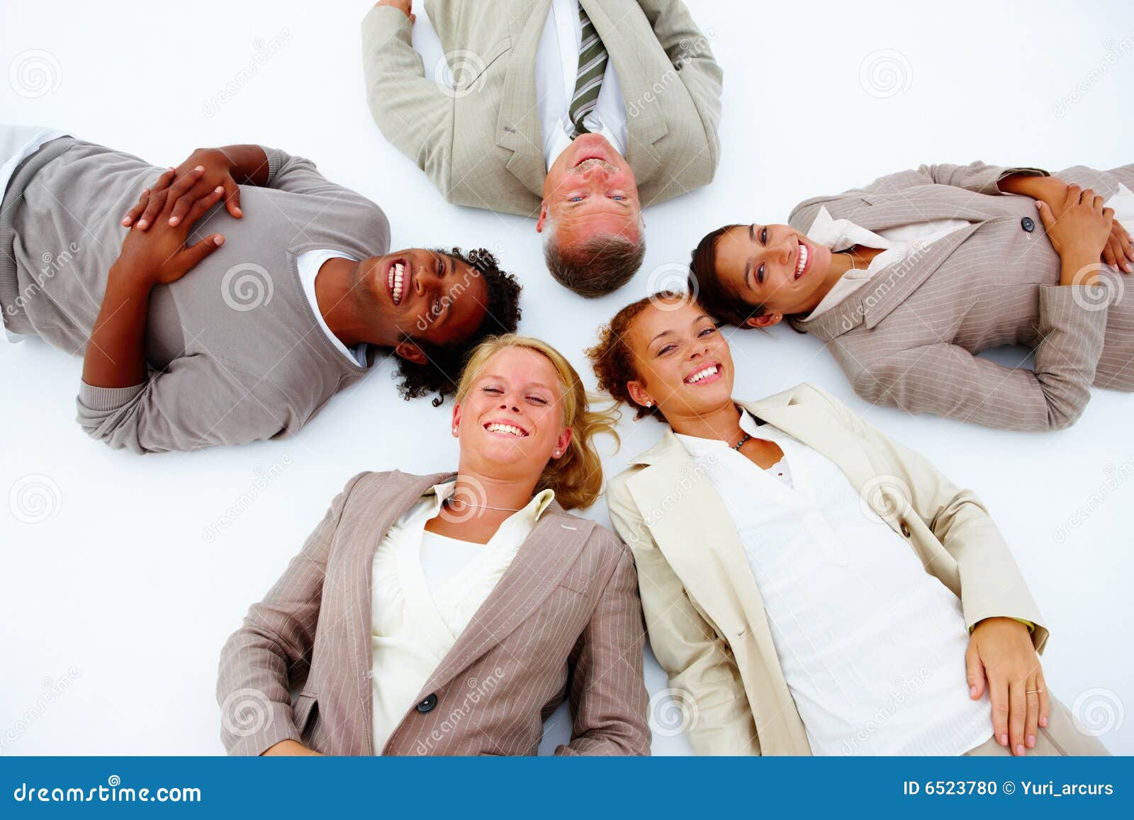 Business People Lying Down Demonstrating Unity Stock Photo - Image of ...