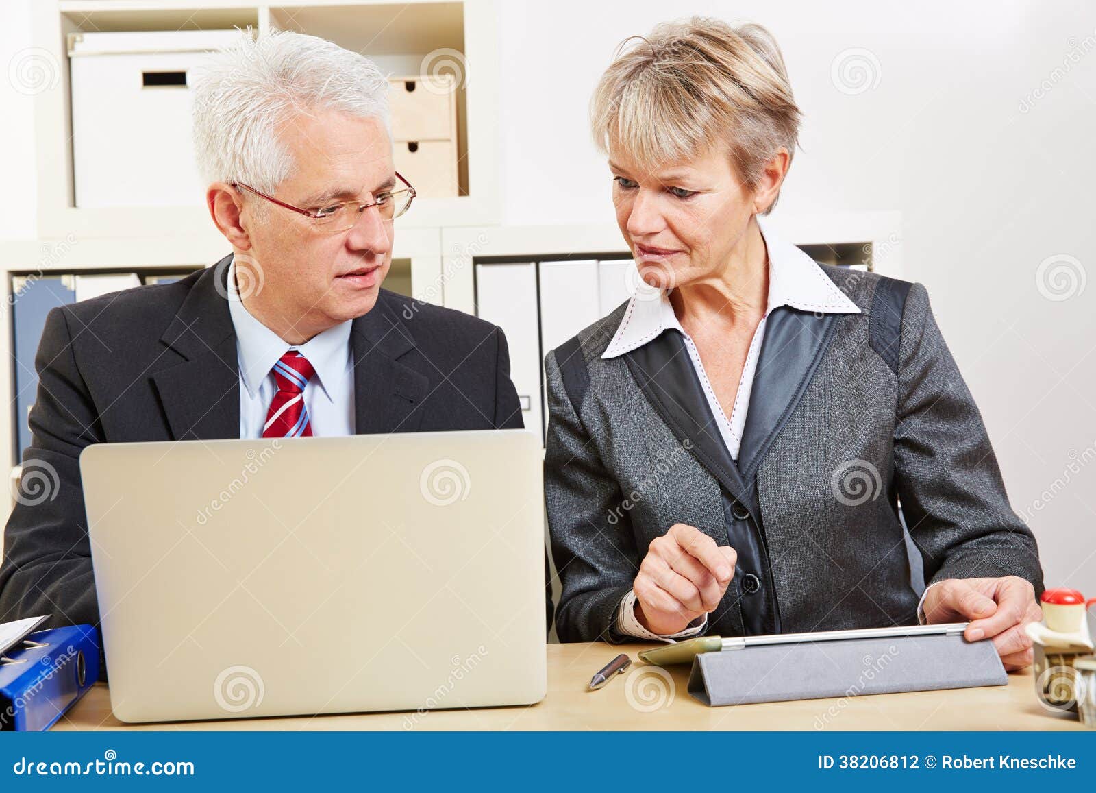 Business People in Office Comparing Stock Photo - Image of ...
