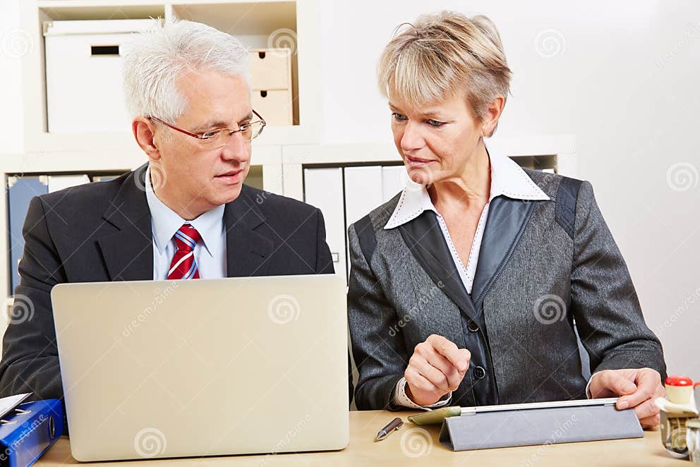 Business People in Office Comparing Stock Photo - Image of ...