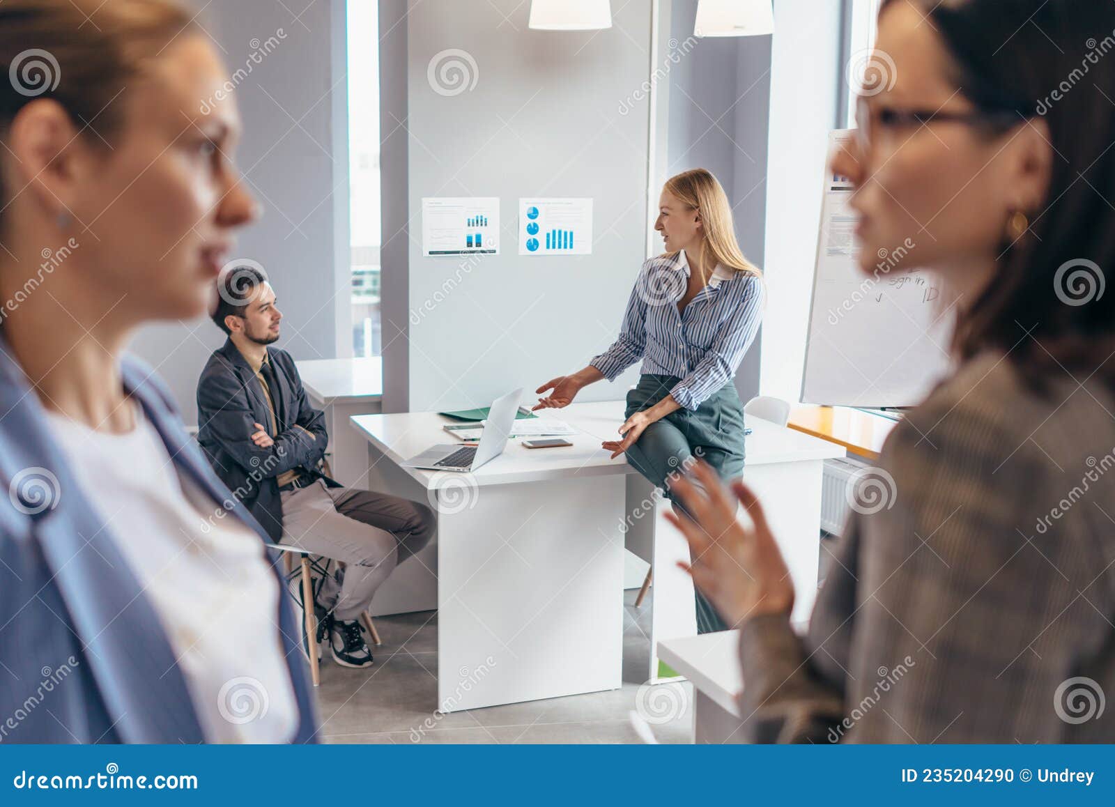 Business People in the Office Talk Informally Stock Photo - Image of ...
