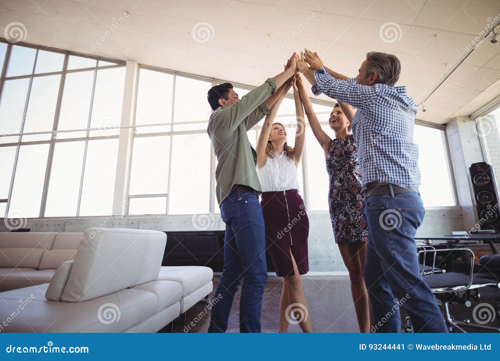 Business People Raising Hands Together at Office Stock Image - Image of ...