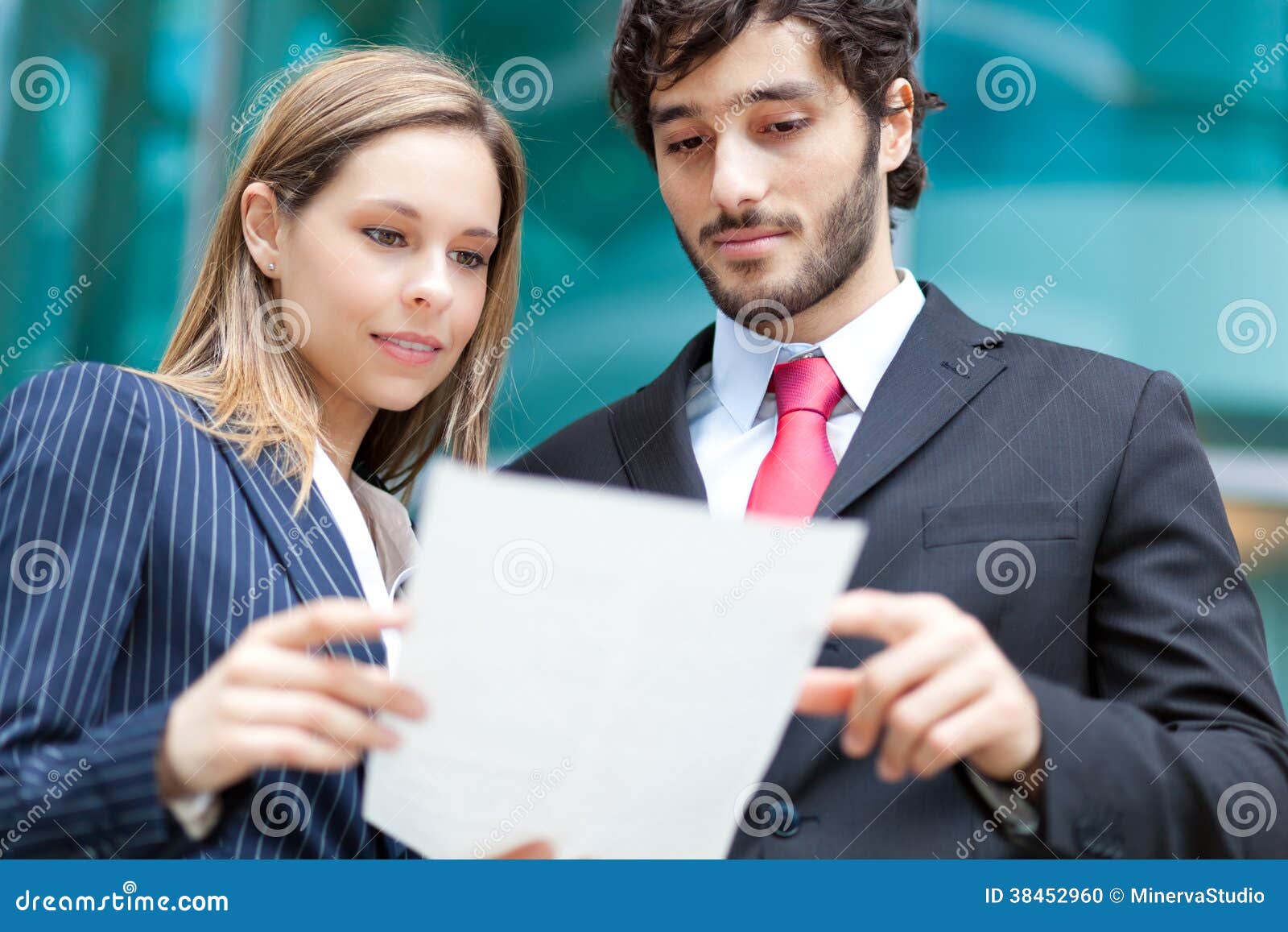 Business People Reading a Document Stock Photo - Image of employees ...