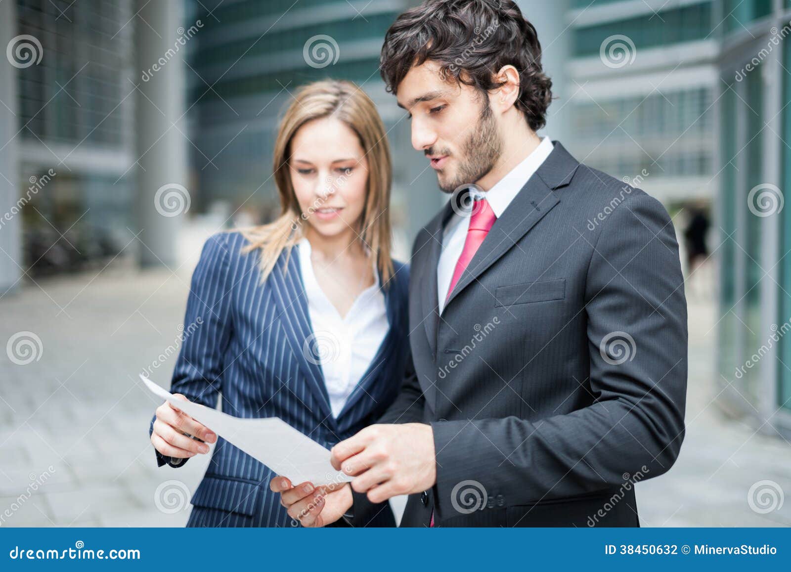 Business People Reading a Document Stock Photo - Image of business ...