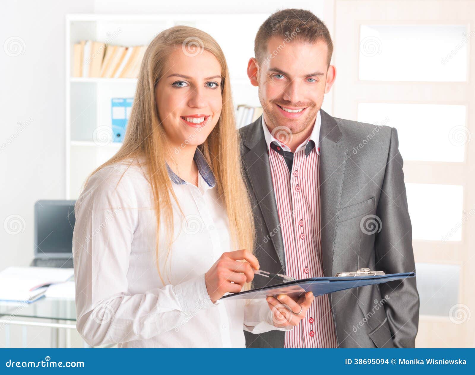 Business People Reading a Document Together Stock Photo - Image of ...