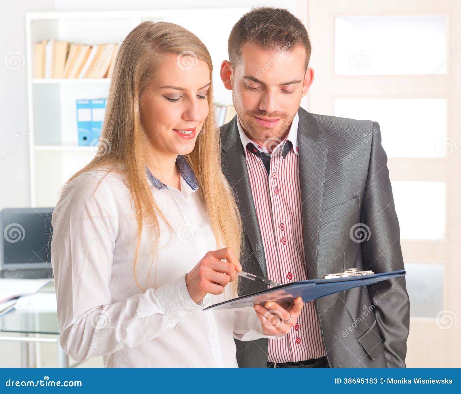 Business People Reading a Document Together Stock Image - Image of ...