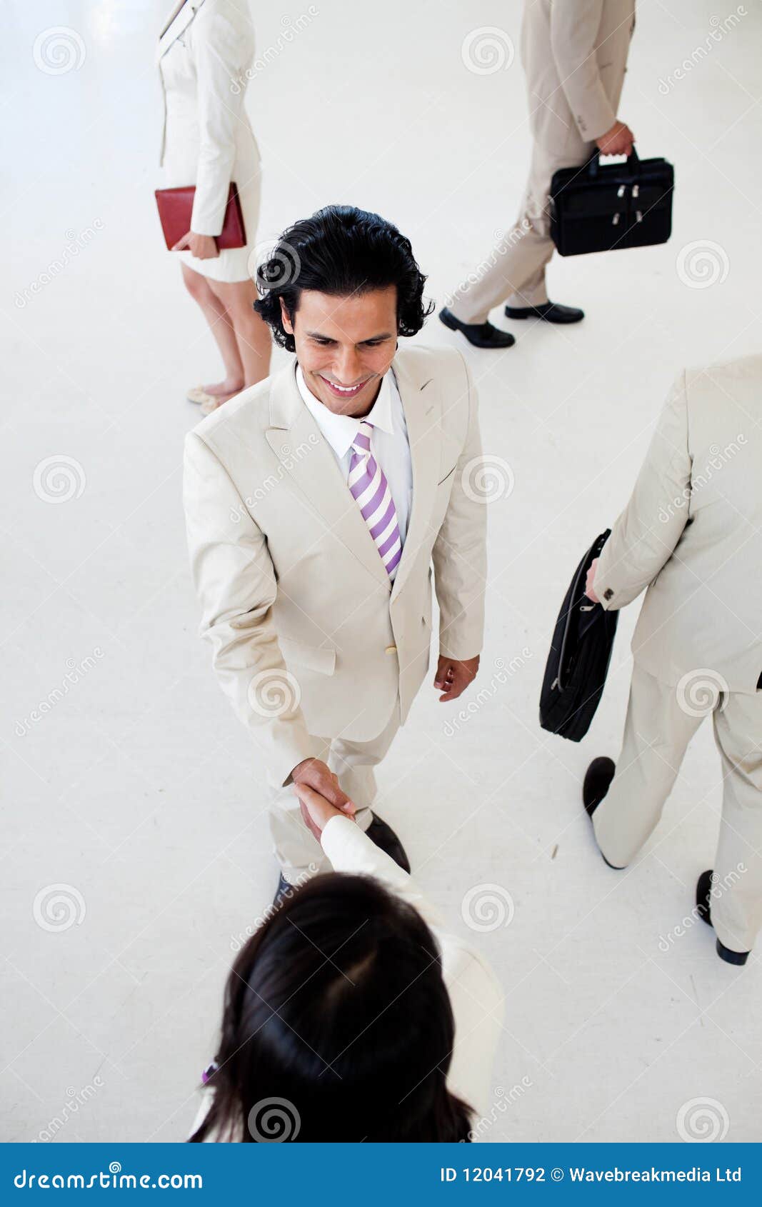 Business People Shaking Hands in a Building Stock Photo - Image of ...