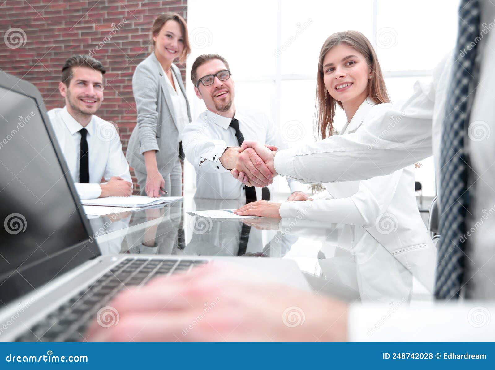 Business People Shaking Hands at the Office Table. Stock Photo - Image ...