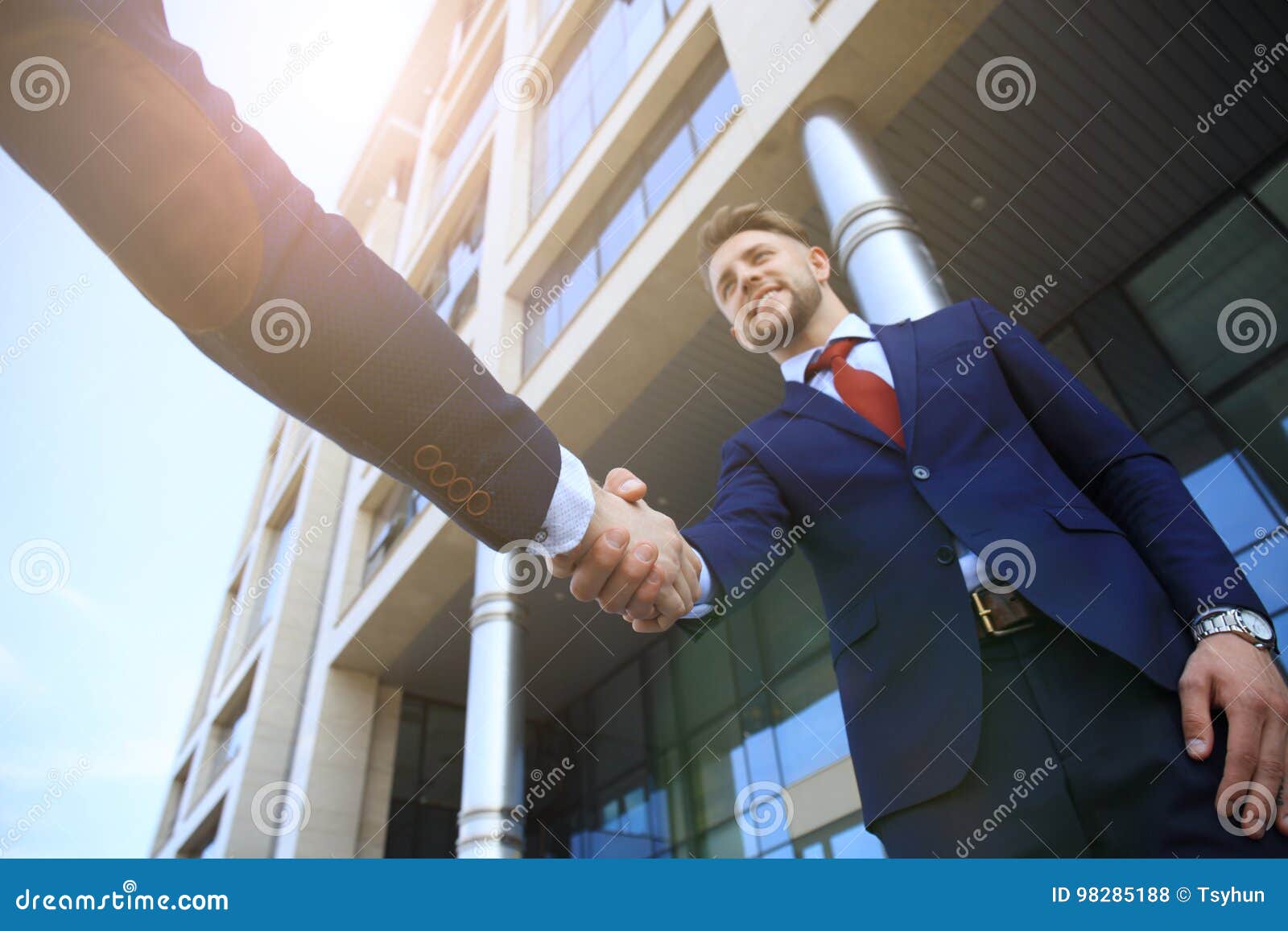 Business People Shaking Hands Outside Modern Office Building. Stock ...