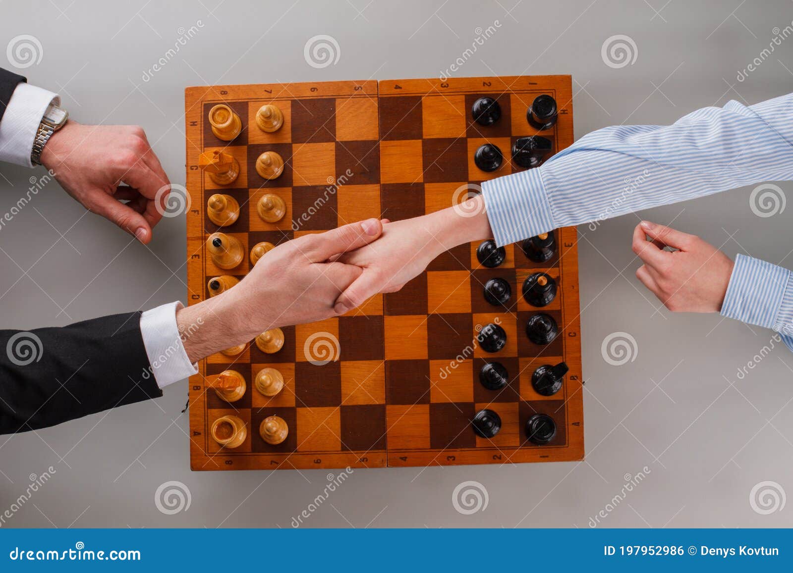 Business People Shaking Hands Over Chess Board. Stock Photo - Image of ...
