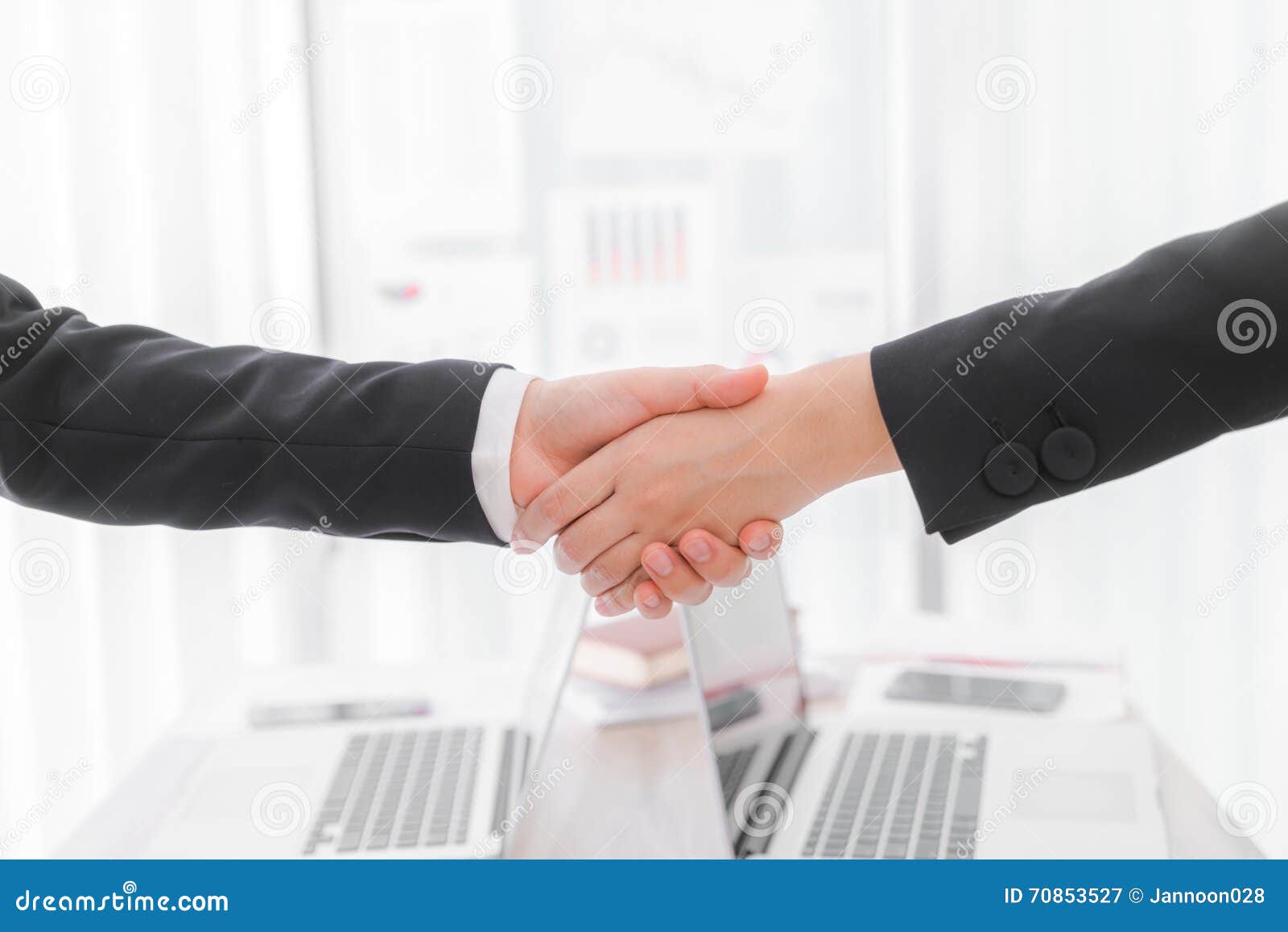 Business People Shaking Hands Over Laptop. Stock Image - Image of ...