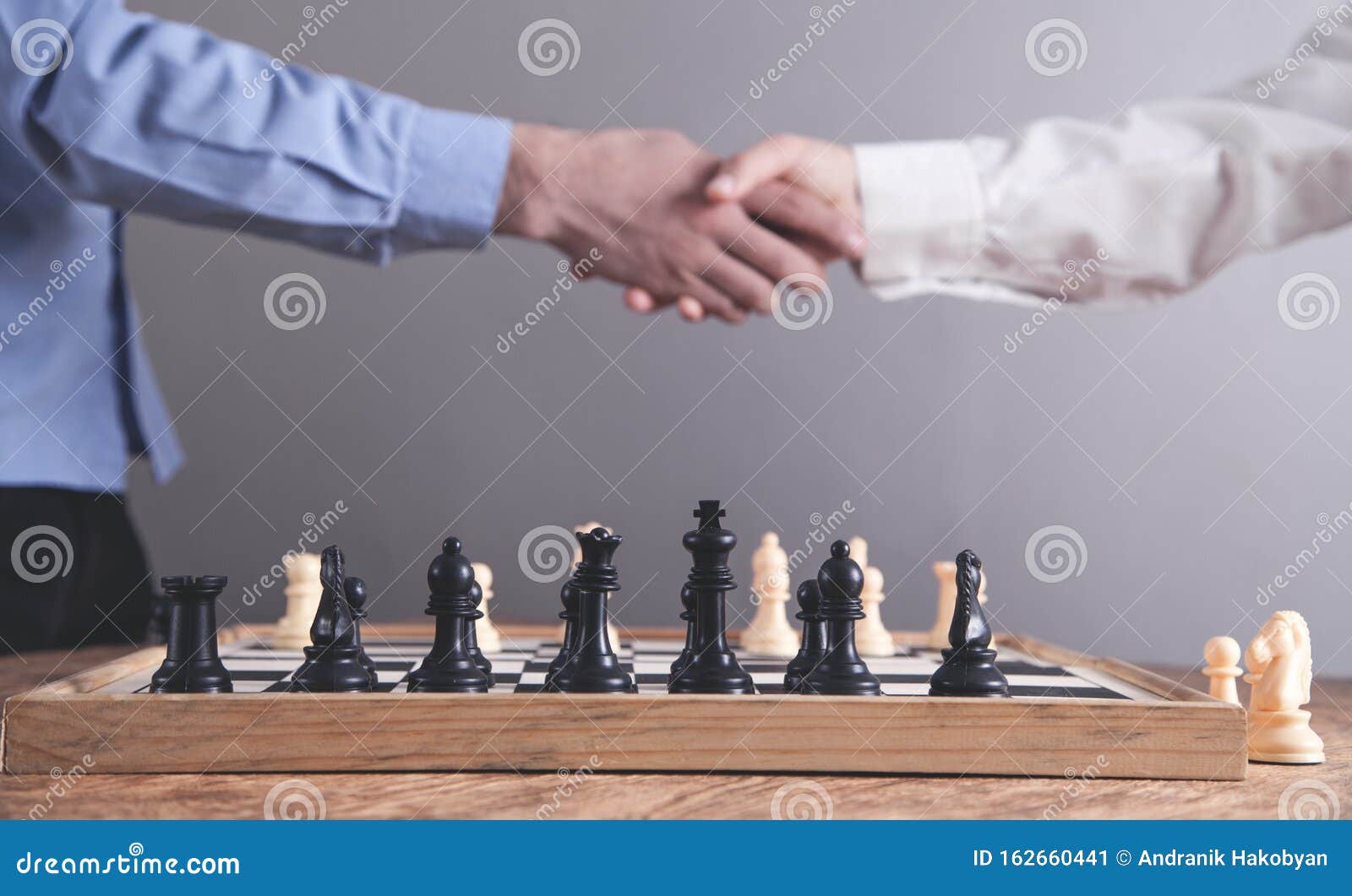 Business People Shaking Hands. Playing Chess Game Stock Image - Image ...