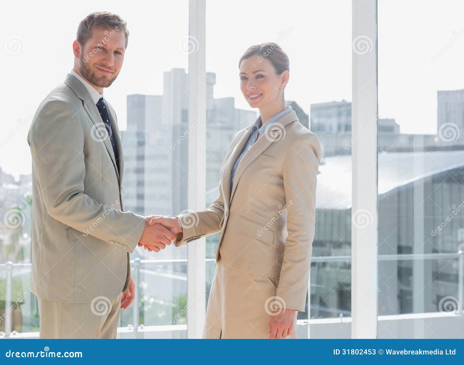 Business People Shaking Hands and Smiling at Camera Stock Image - Image ...