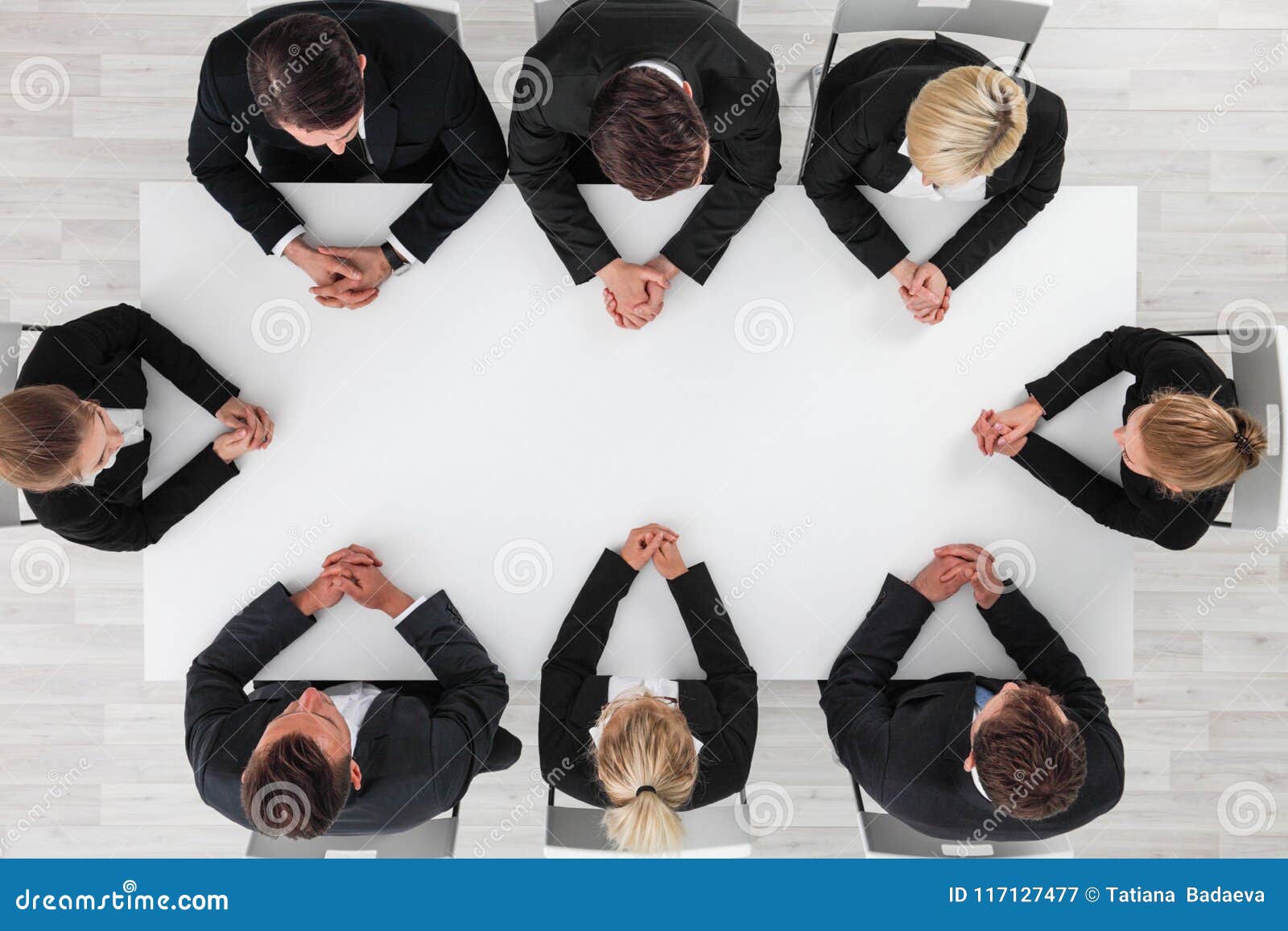 Business People Sitting Around Empty Table Stock Image - Image of ...