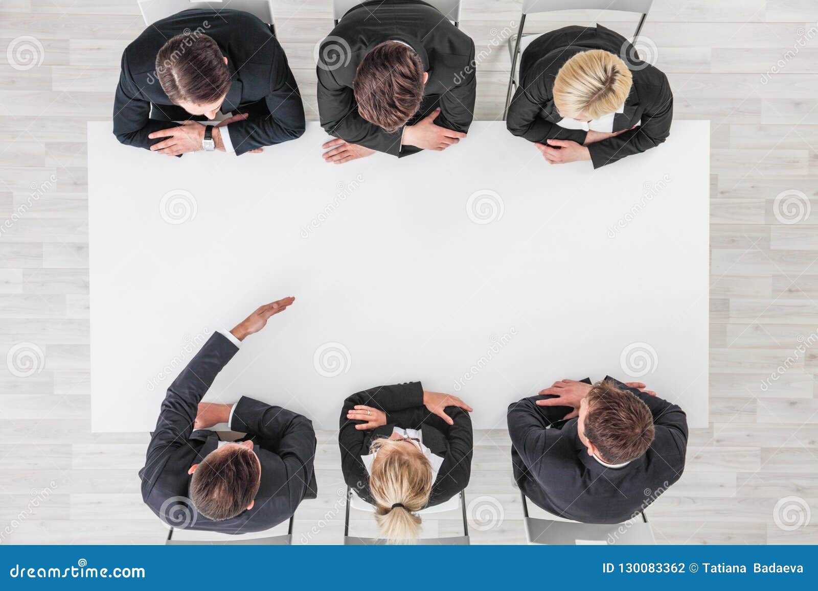 Business People Sitting Around Empty Table Stock Photo - Image of ...