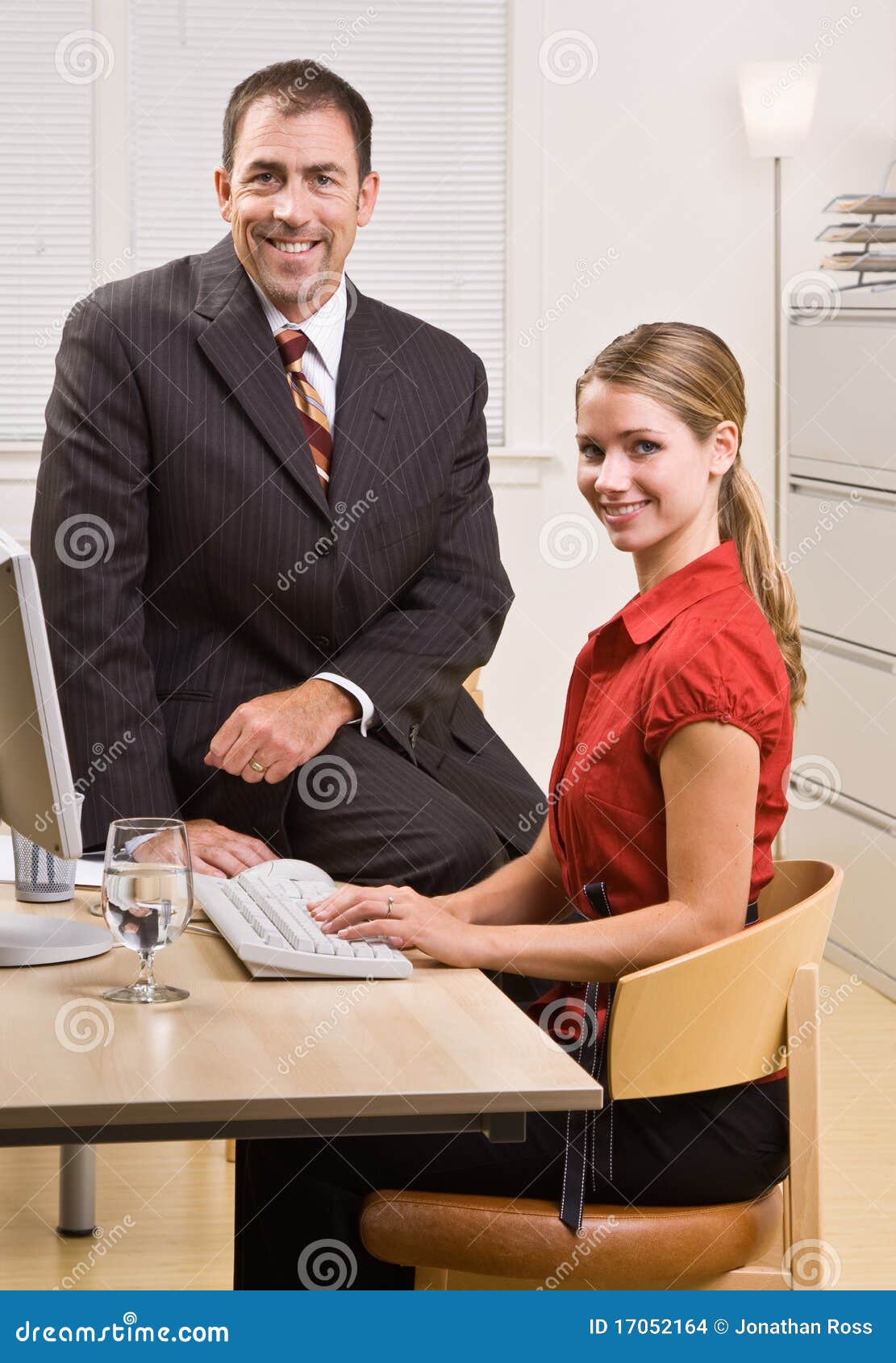 Business People Sitting at Desk Stock Photo - Image of assured ...
