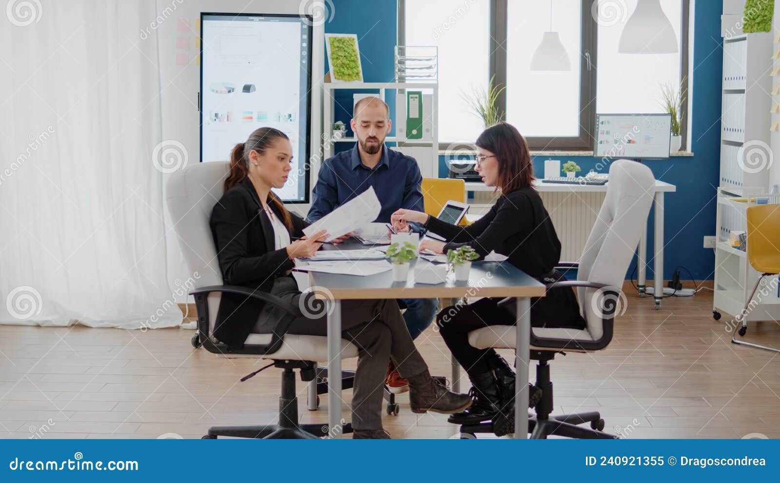Business People Sitting at Desk and Working on Project Planning Stock ...