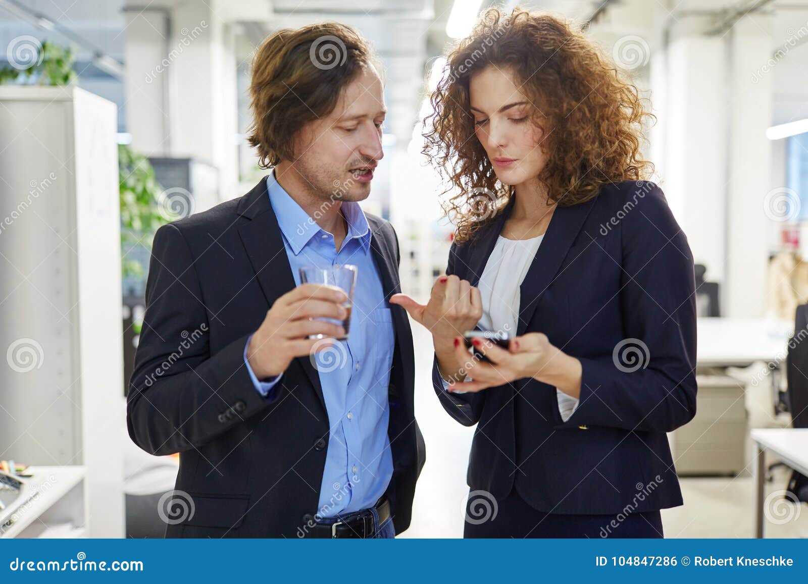 Business People with Smartphone Discussing Stock Photo - Image of ...