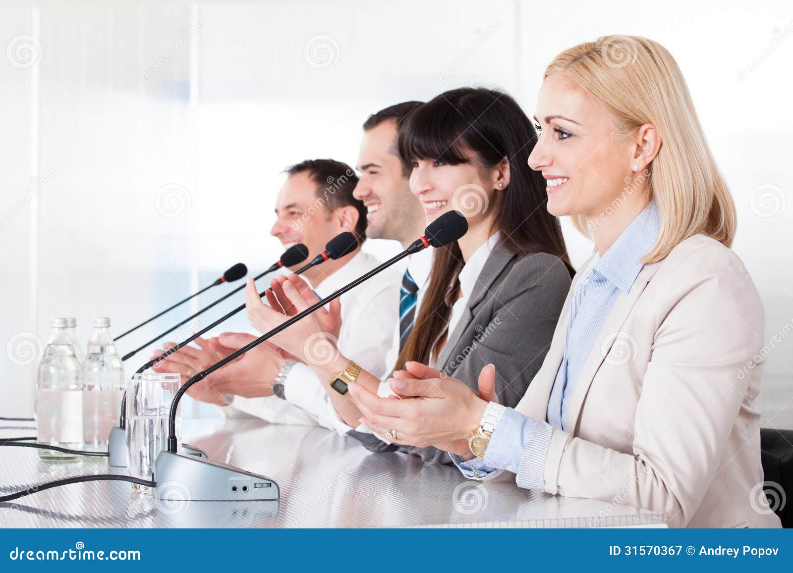 Business People Speaking in Microphone Stock Image - Image of happy ...