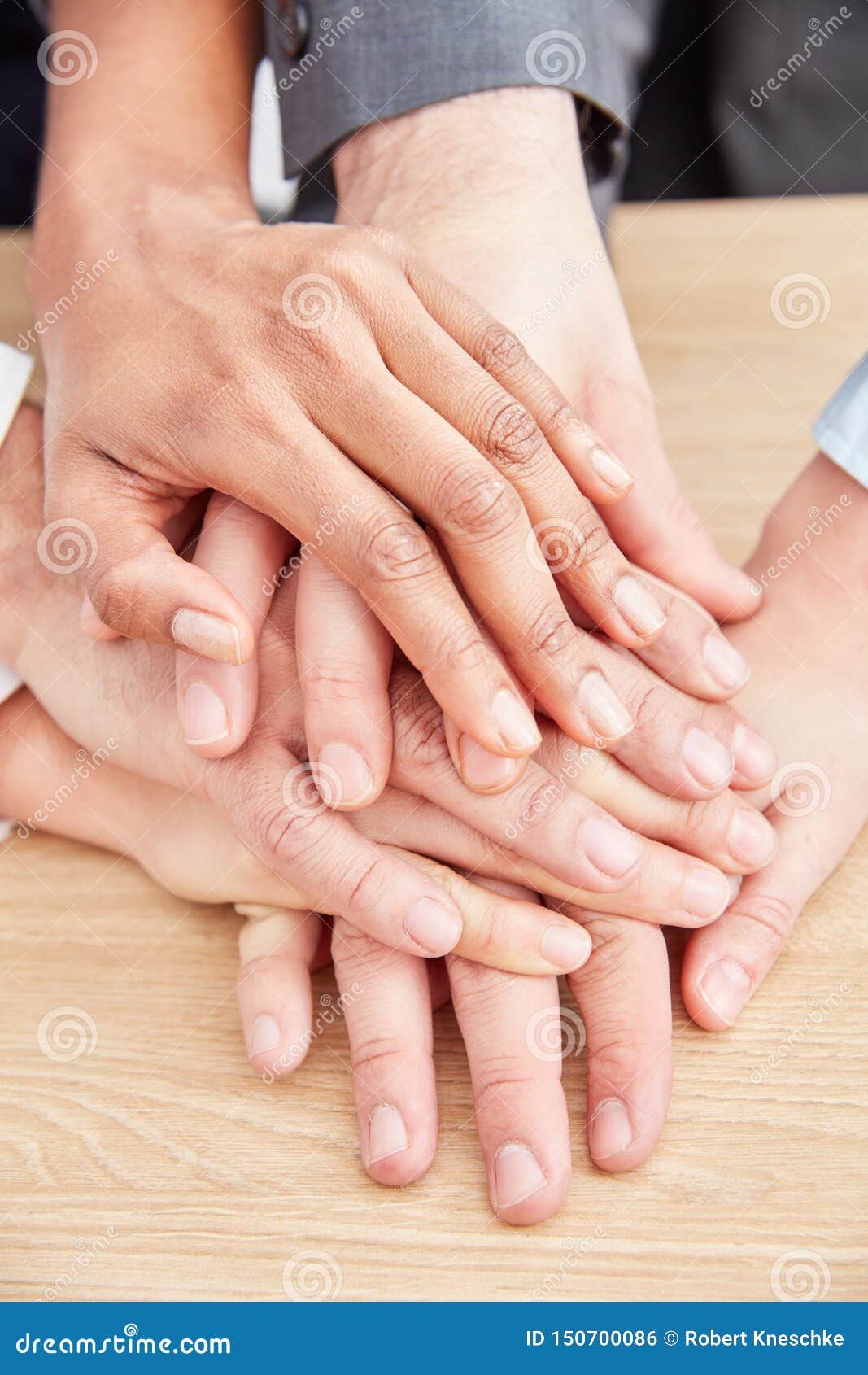 Business People Stack Hands As a Sign for Teambuilding Stock Photo ...
