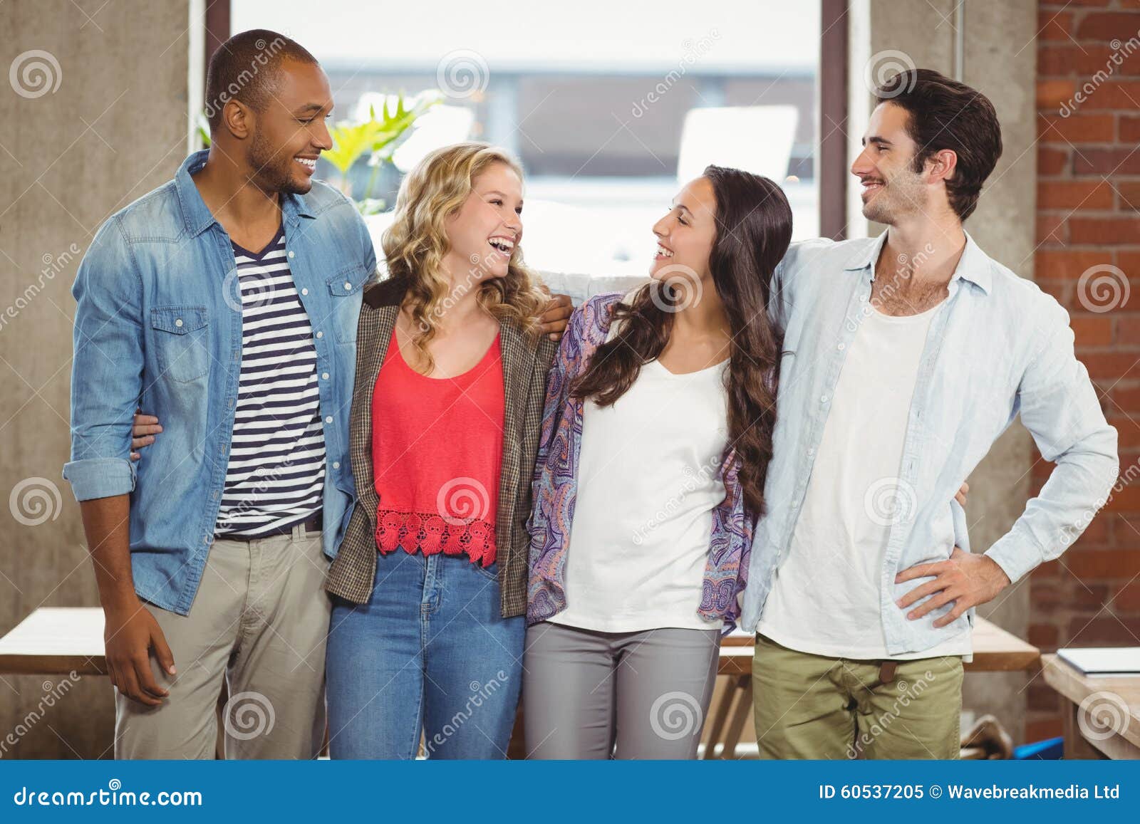 Business People Standing and Laughing in Office Stock Image - Image of ...