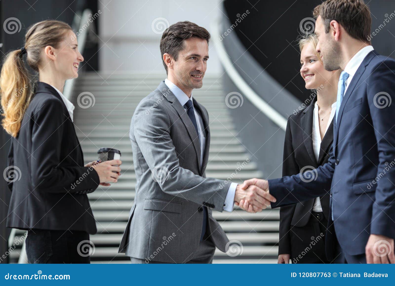 Business People Standing in Office Lobby Stock Image - Image of ...