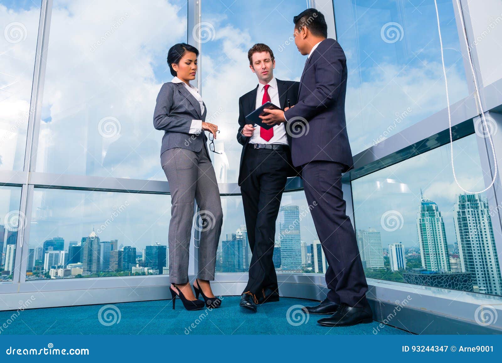 Business People Standing at Office Window Working Stock Image - Image ...