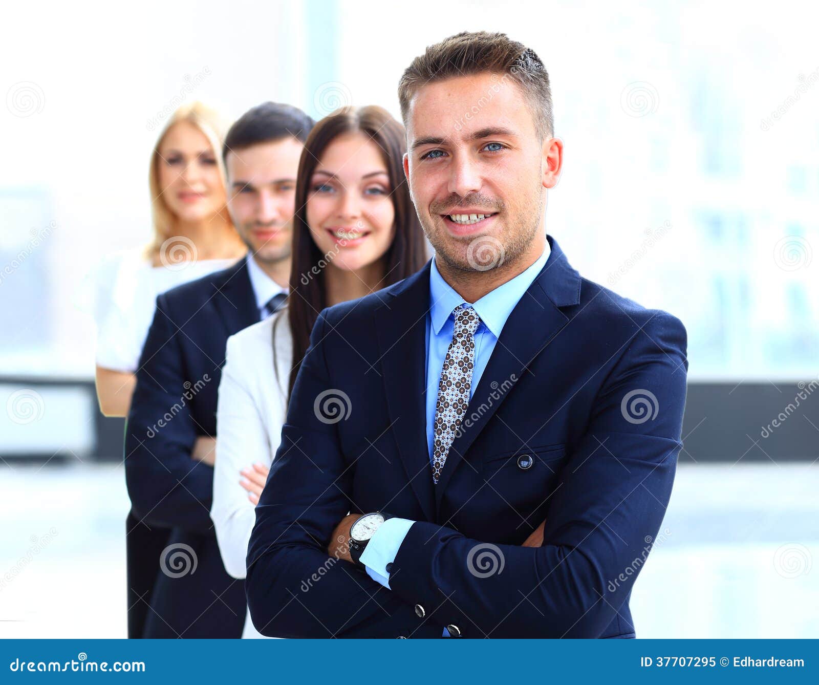 Business People Standing Together in Line in a Modern Office Stock ...
