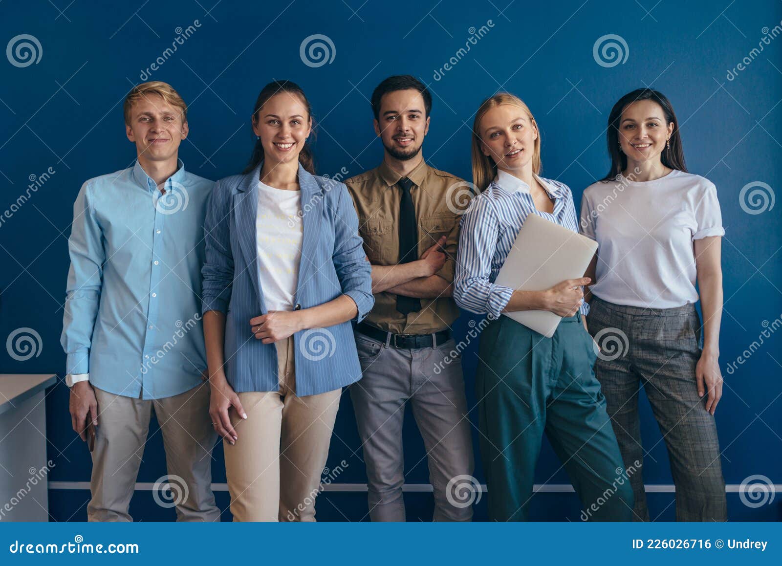 Business People Standing Together. Team of Young Business Professionals ... Business People Standing Together. Team of Young Business Professionals ...