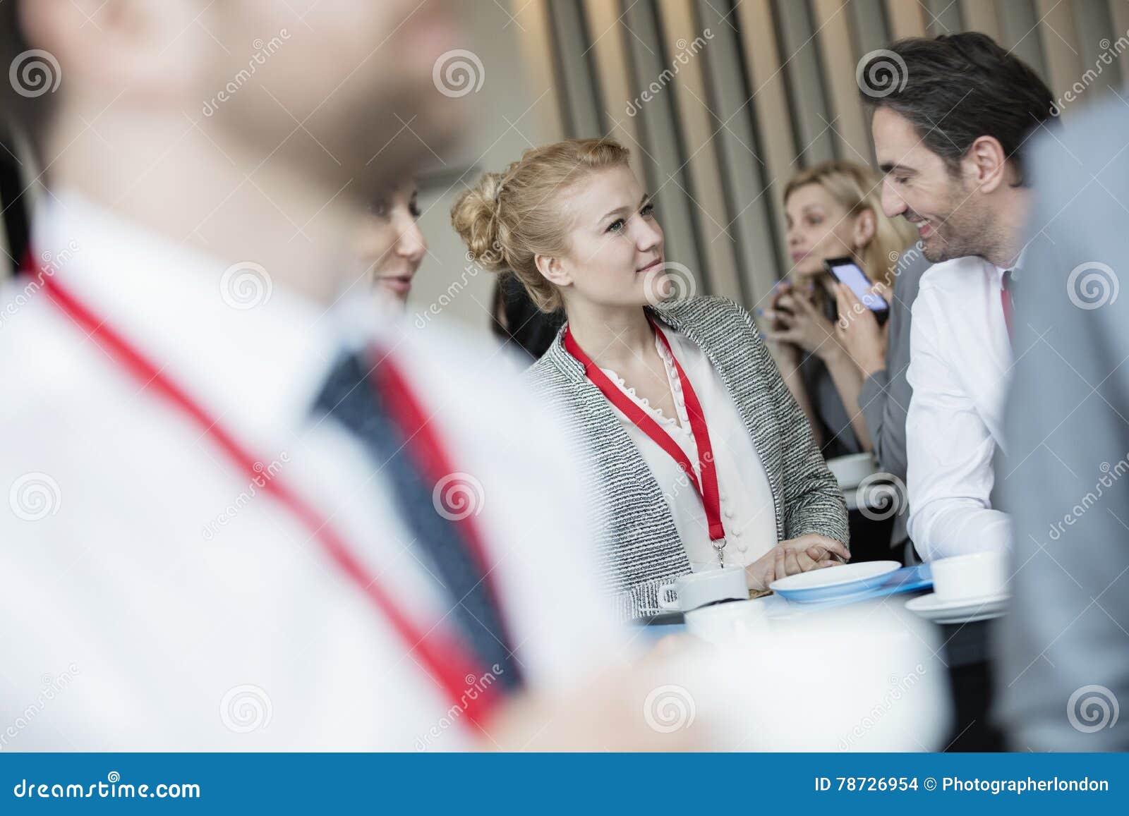Business People Talking at Lobby in Convention Center Stock Photo ...