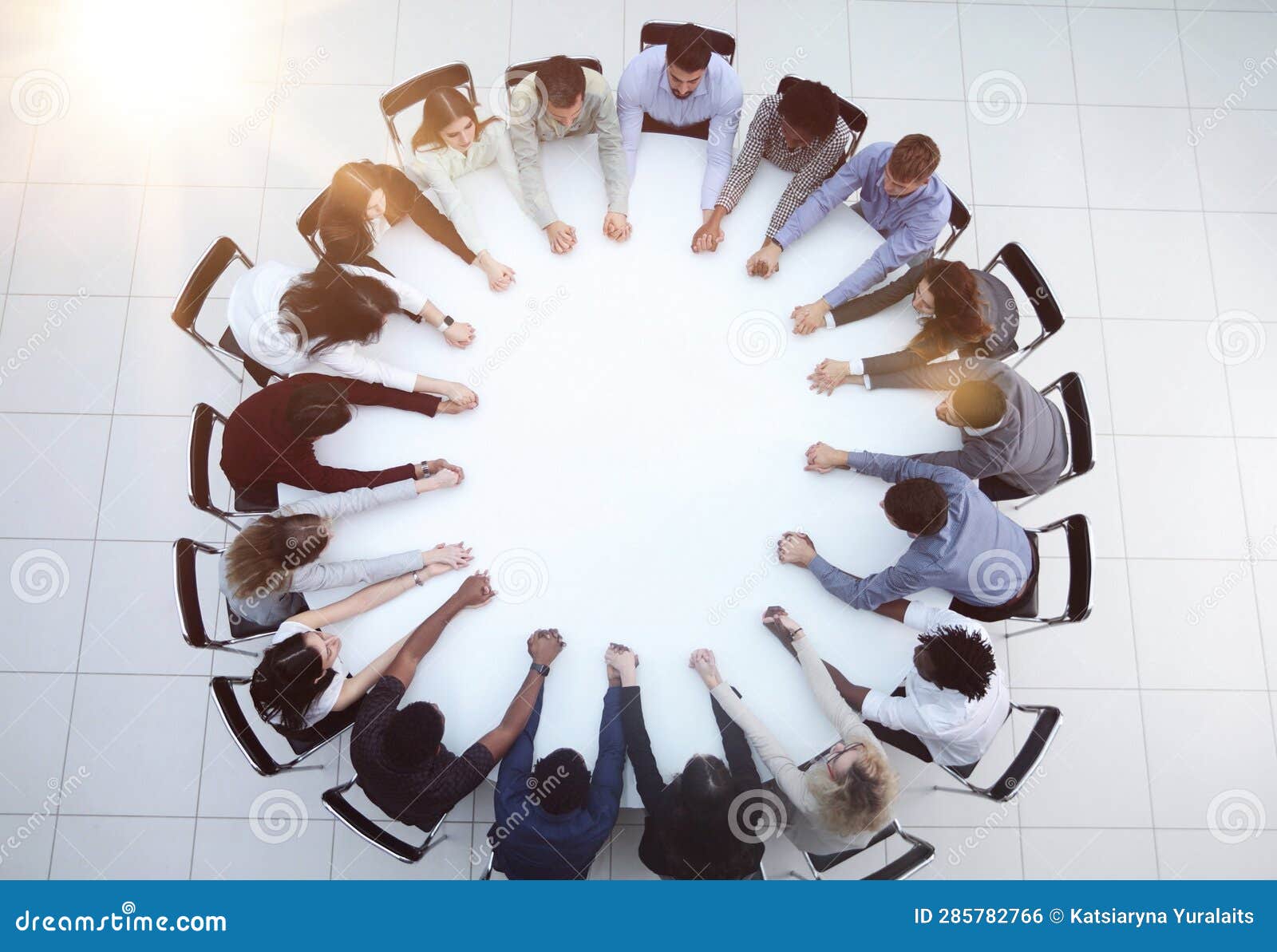 Business People Talking in Office Sitting at a Round Table Stock Photo ...