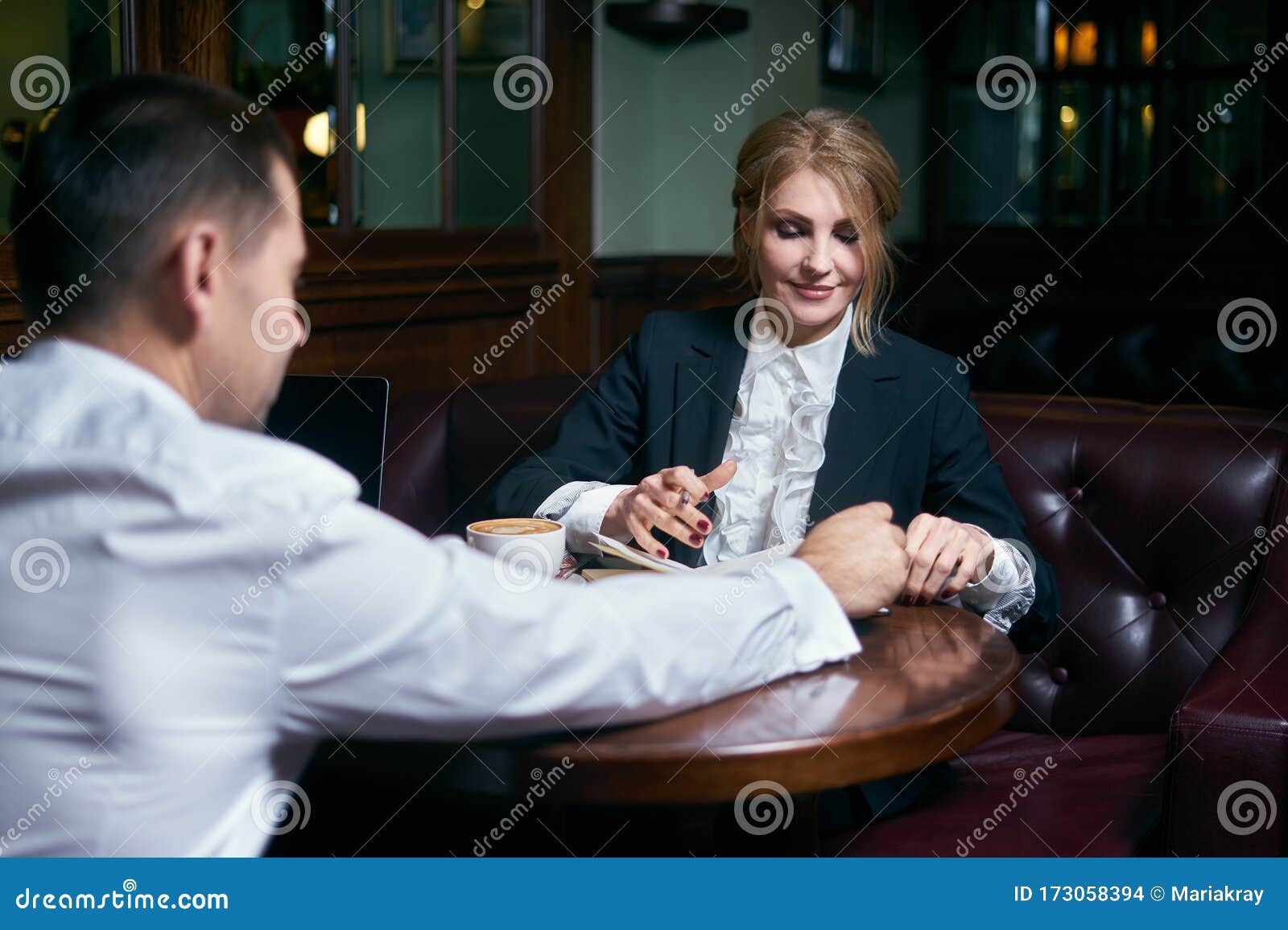 Business People Talking Over Coffee in Cafe Stock Photo - Image of ...