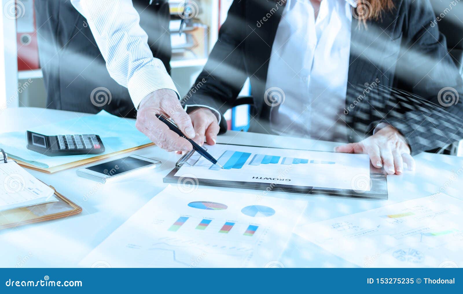 Business People Talking about Business Performance; Multiple Exposure ...