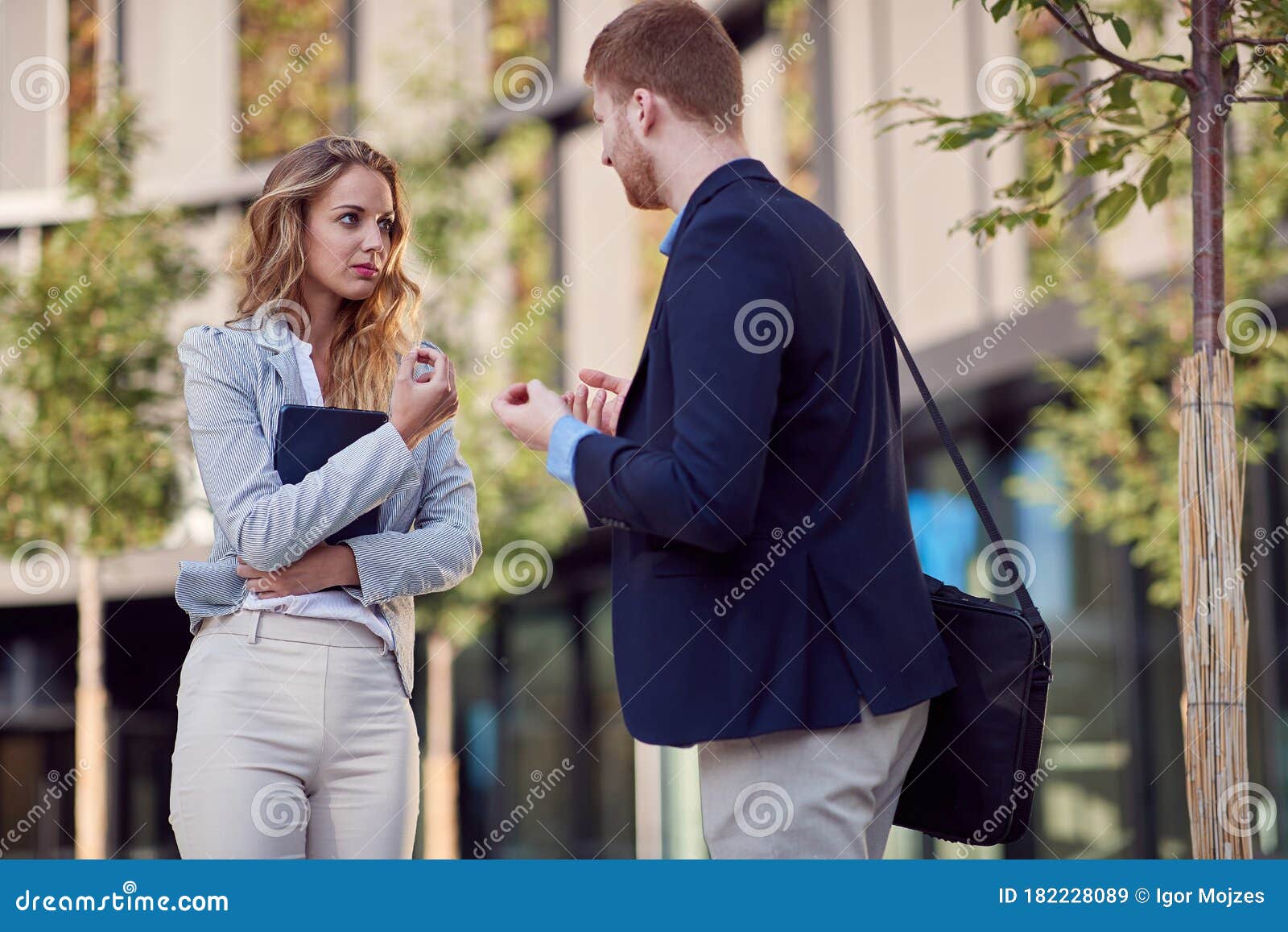 Business People Talking Together and Standing Outdoors Stock Image ...