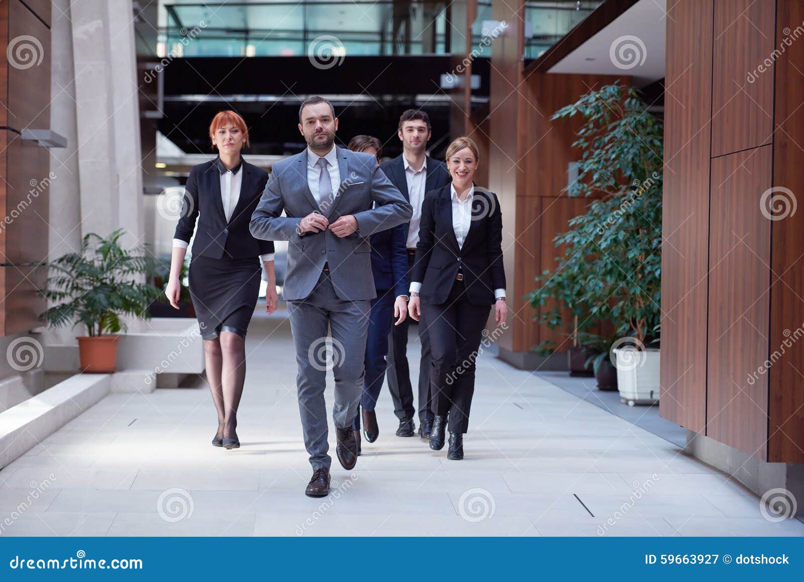 Business People Team Walking Stock Image - Image of street, bright ...