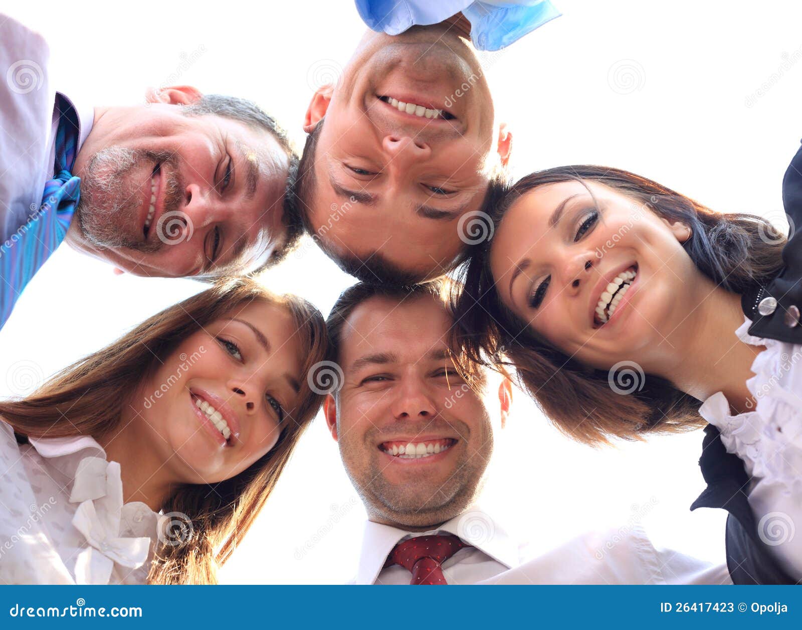 Business People with Their Heads Together Stock Image - Image of ...