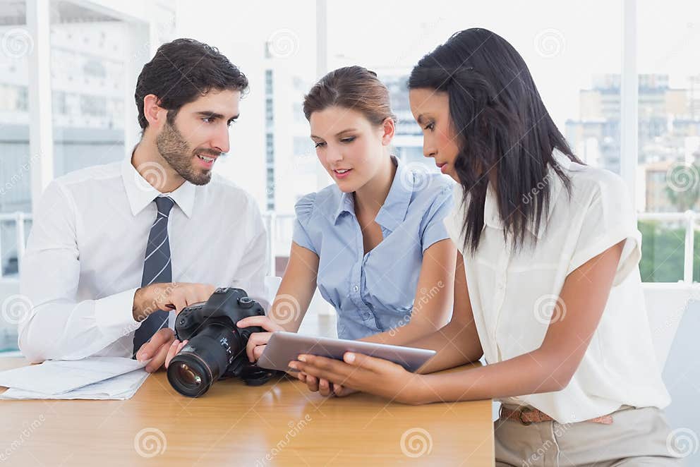 Business People Using a Camera Stock Photo - Image of adult, colleagues ...