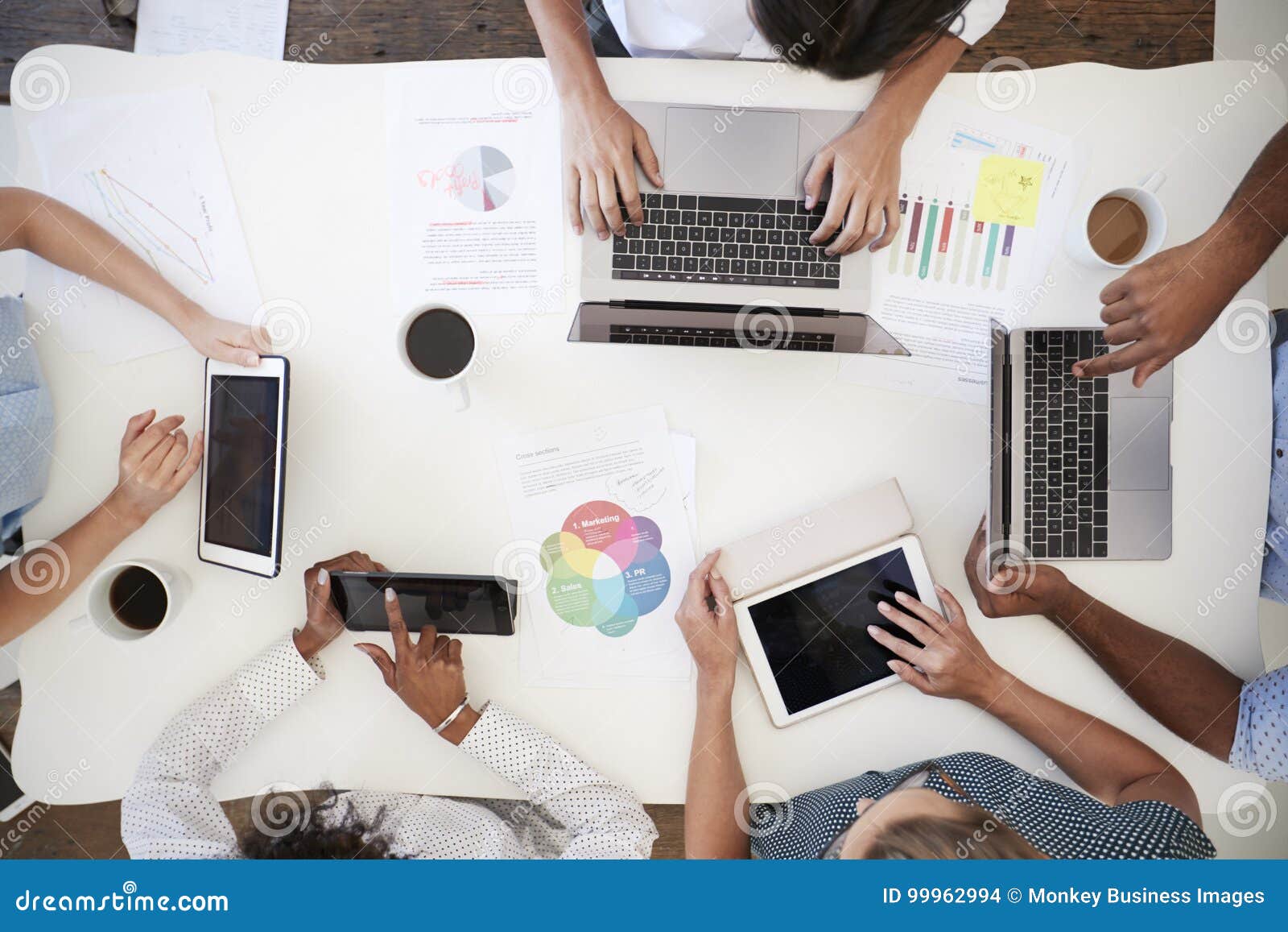 Business People Using Computers at a Desk, Overhead Shot Stock Photo ... Business People Using Computers at a Desk, Overhead Shot Stock Photo ...