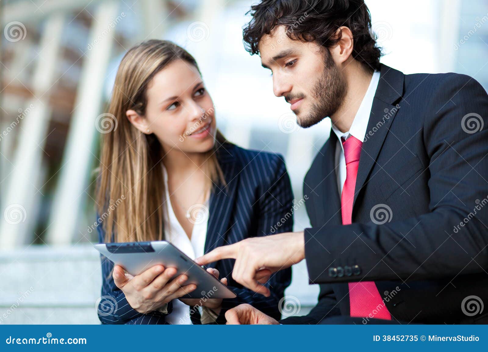 Business People Using a Digital Tablet Stock Image - Image of person ...