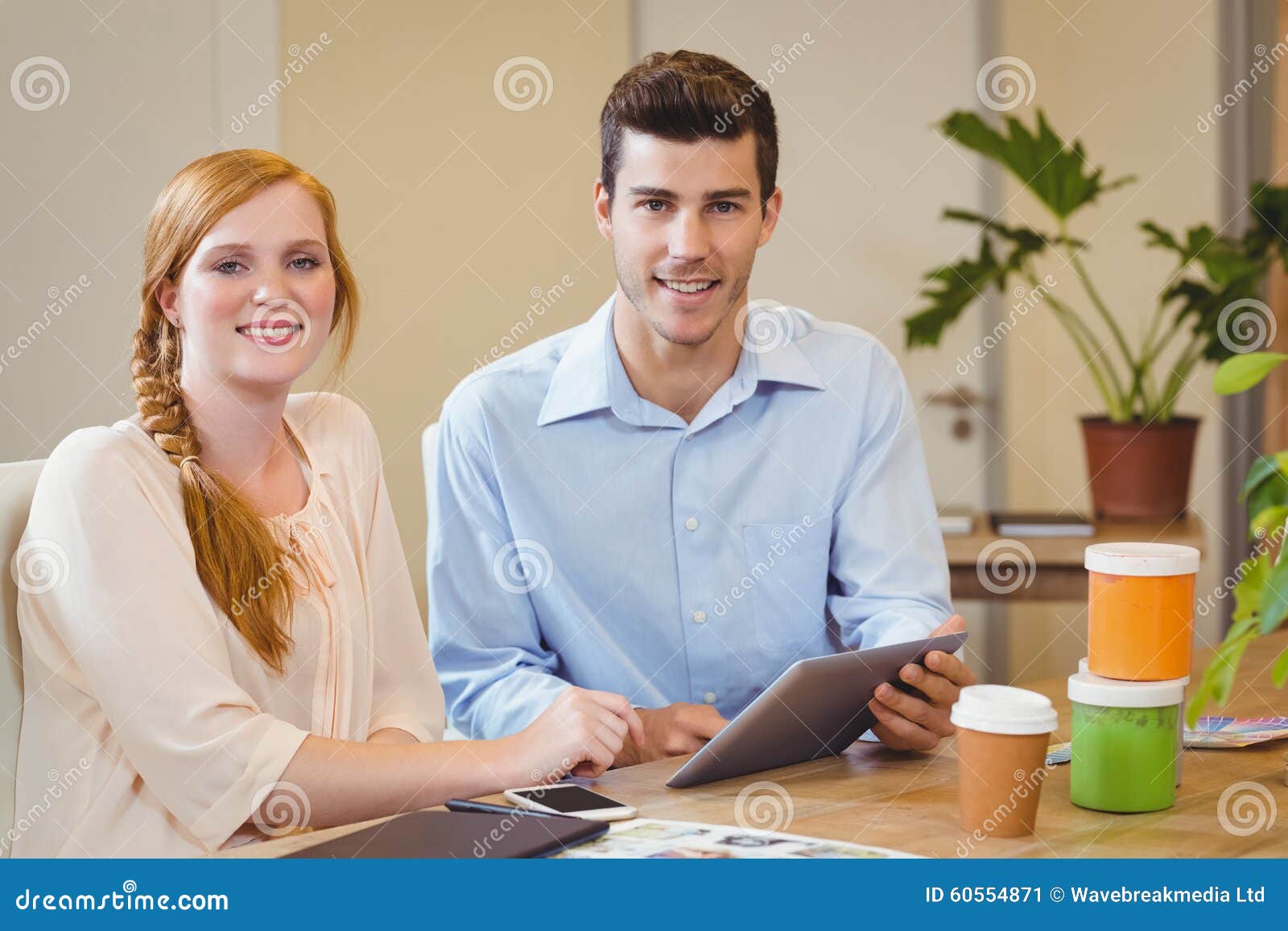 Business People Using Digital Tablet at Desk Stock Image - Image of ...