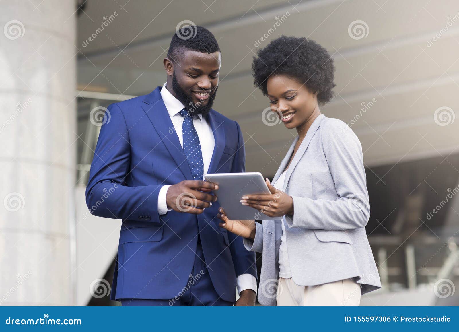 Business People Using Digital Tablet and Discussing New Project ...