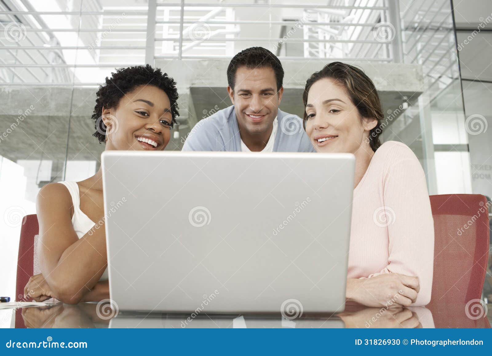 Business People Using Laptop at Conference Table Stock Photo - Image of ...