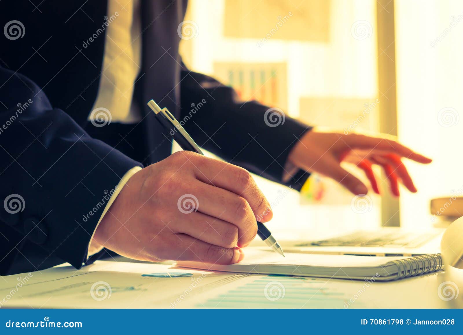 Business People Using a Pencil Noting Over Laptop Stock Photo - Image ...