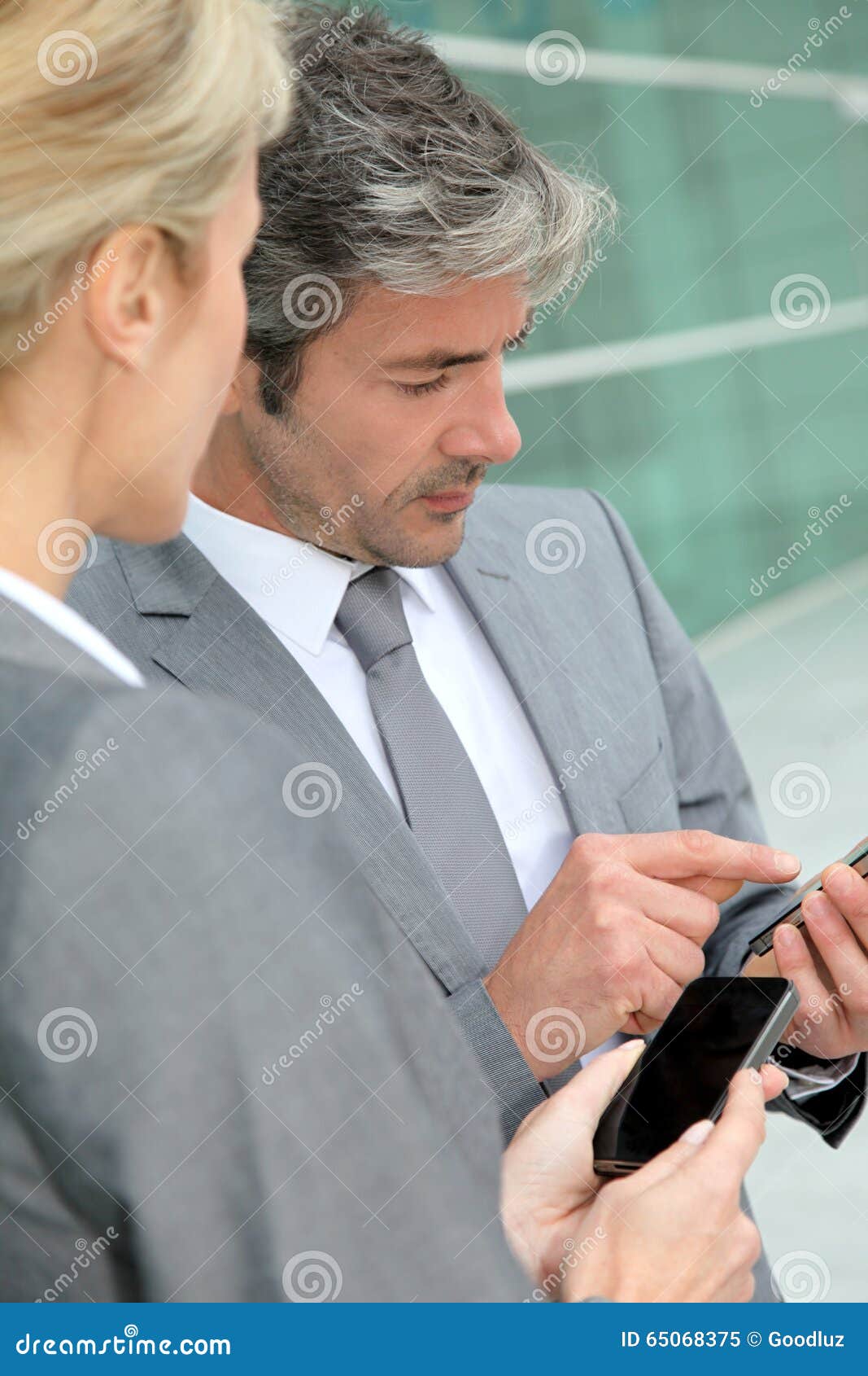Business People Using Smartphones Stock Image - Image of giving ...