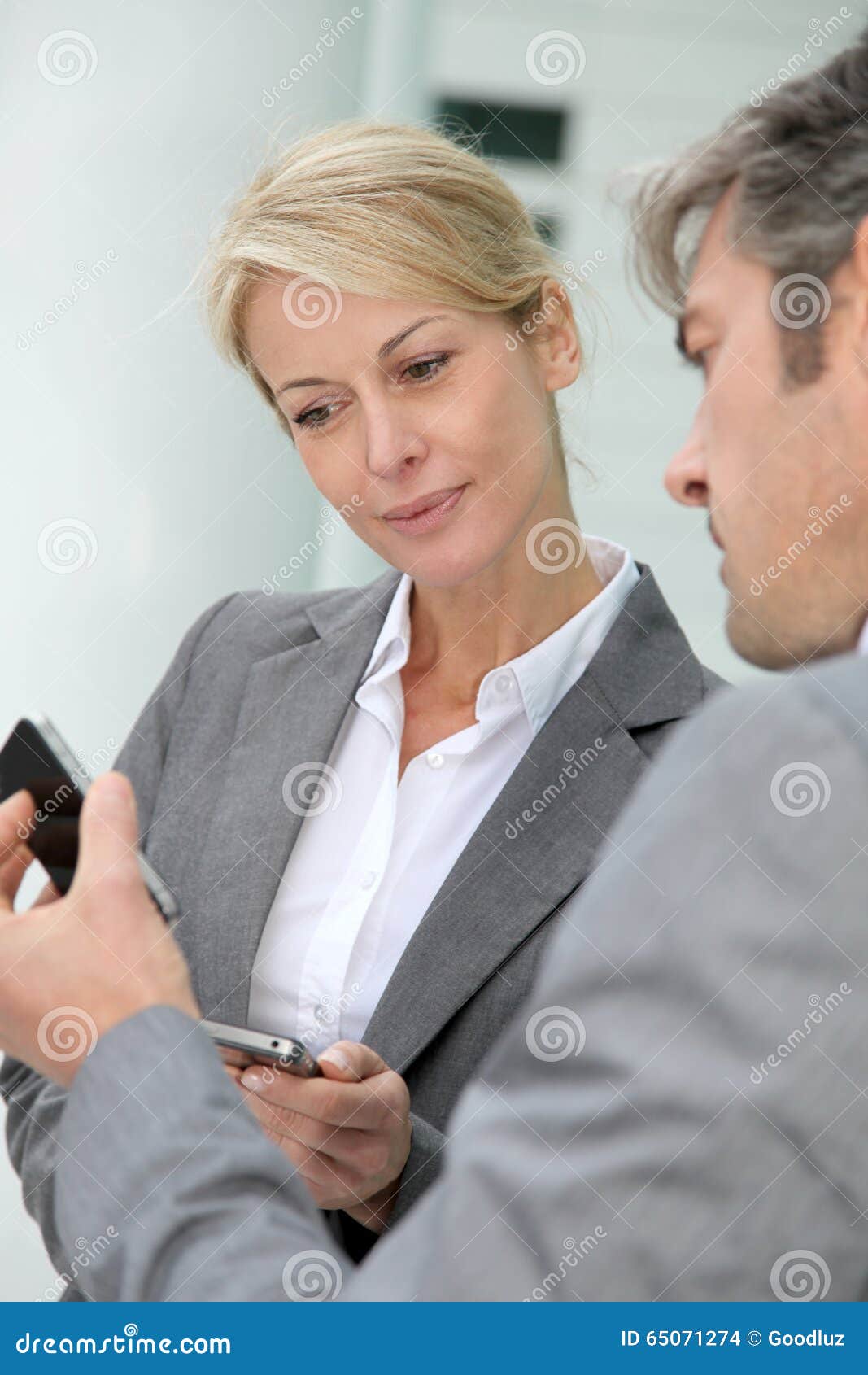 Business People Using Smartphones Stock Photo - Image of businesswoman ...